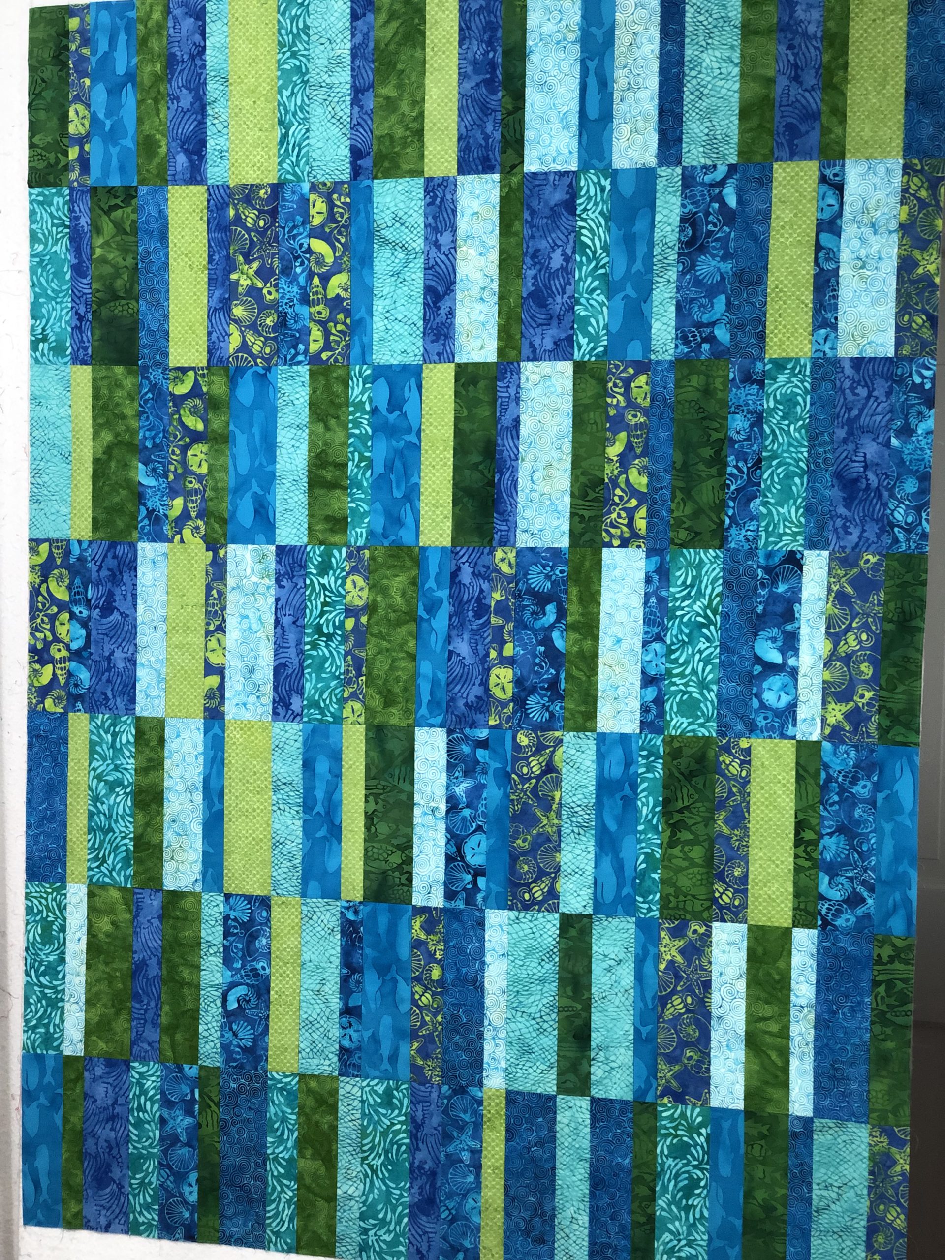 High Rise Quilt Featuring Calm Lagoon from Island Batik - Studio R Quilts